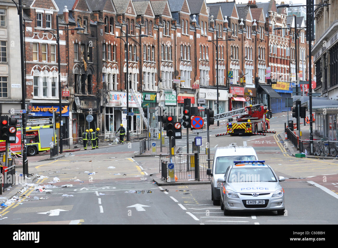 London Riots Clapham Junction burnt out shop rioting looting fire clean ...