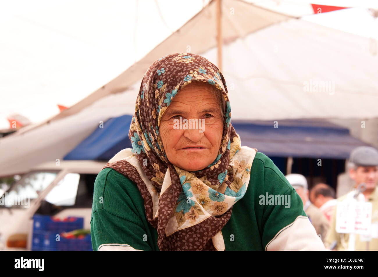 Elderly woman making Gözleme, a traditional Turkish food, Kalkan ...