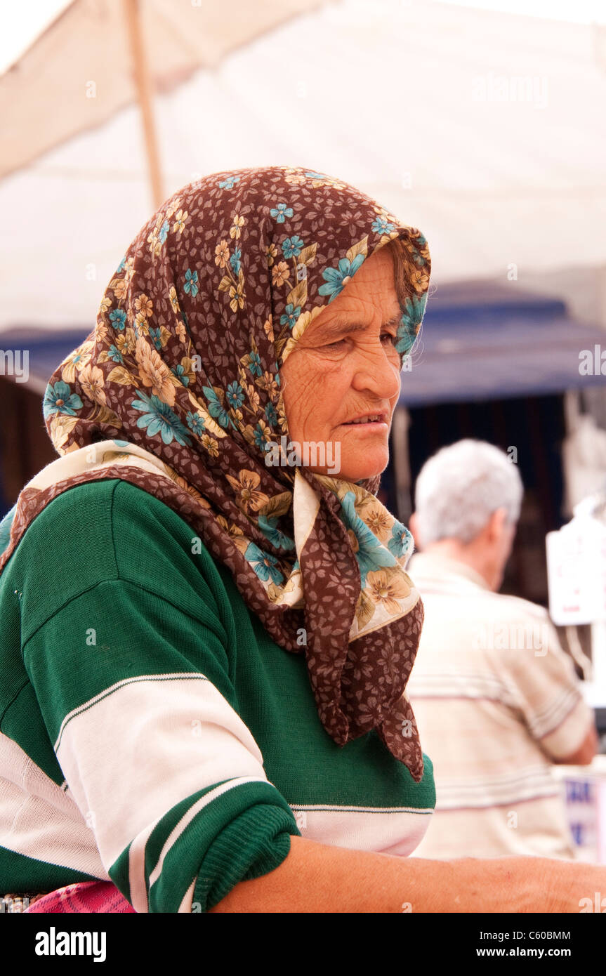 Elderly woman making Gözleme, a traditional Turkish food, Kalkan ...