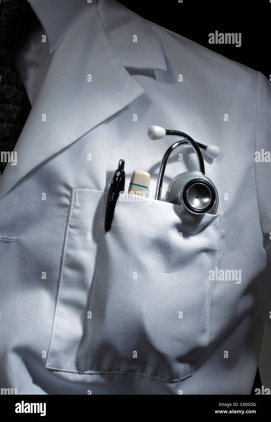 Doctors Lab Coat with instruments Stock Photo - Alamy