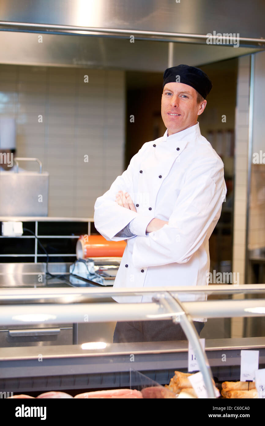 Supermarket meat counter service staff hi-res stock photography and ...