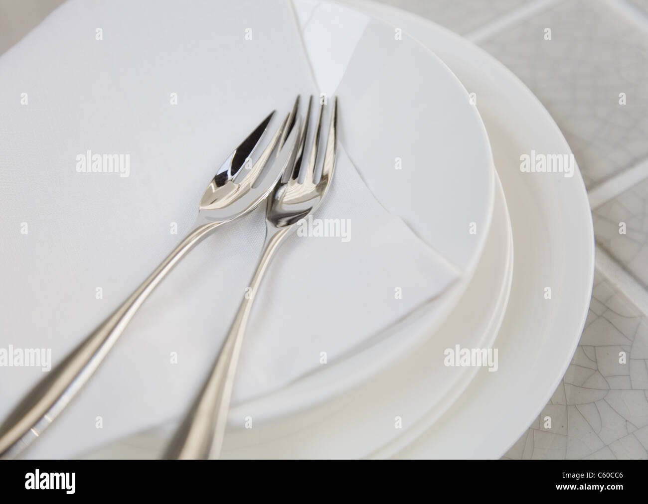 Forks and dishes Stock Photo - Alamy