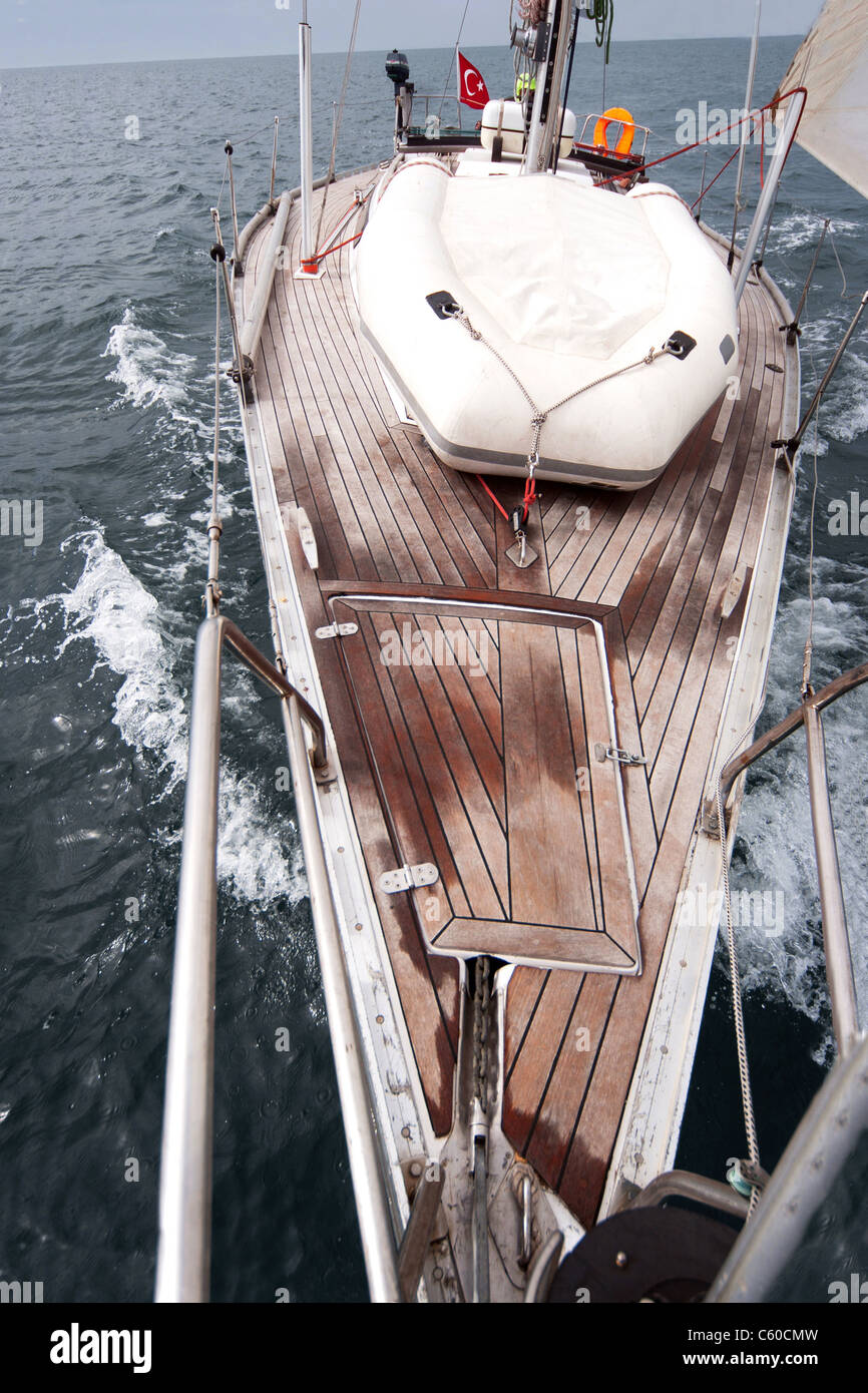 Front view of sailing boat with water splash Stock Photo - Alamy