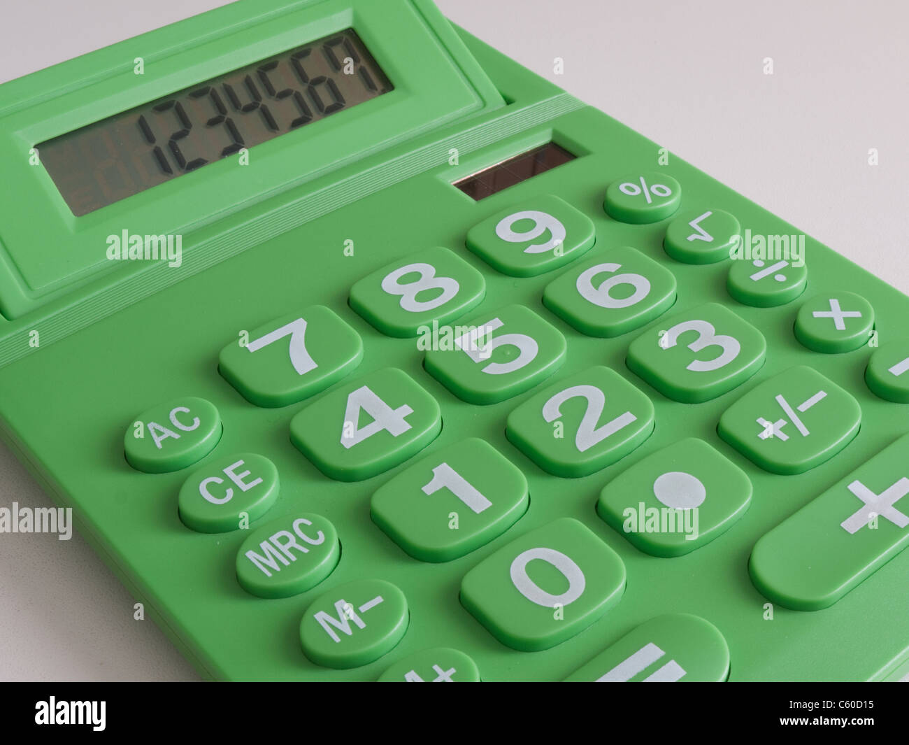 Green calculator which runs on solar power Stock Photo - Alamy