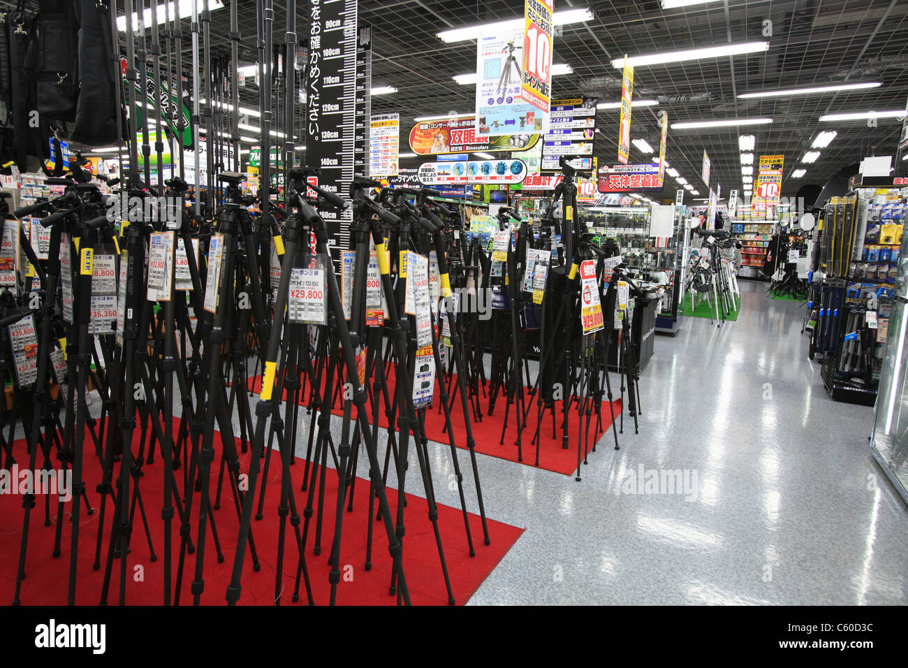 Camera tripods for sale in Yodobashi Camera store in Tokyo, 2011 Stock ...