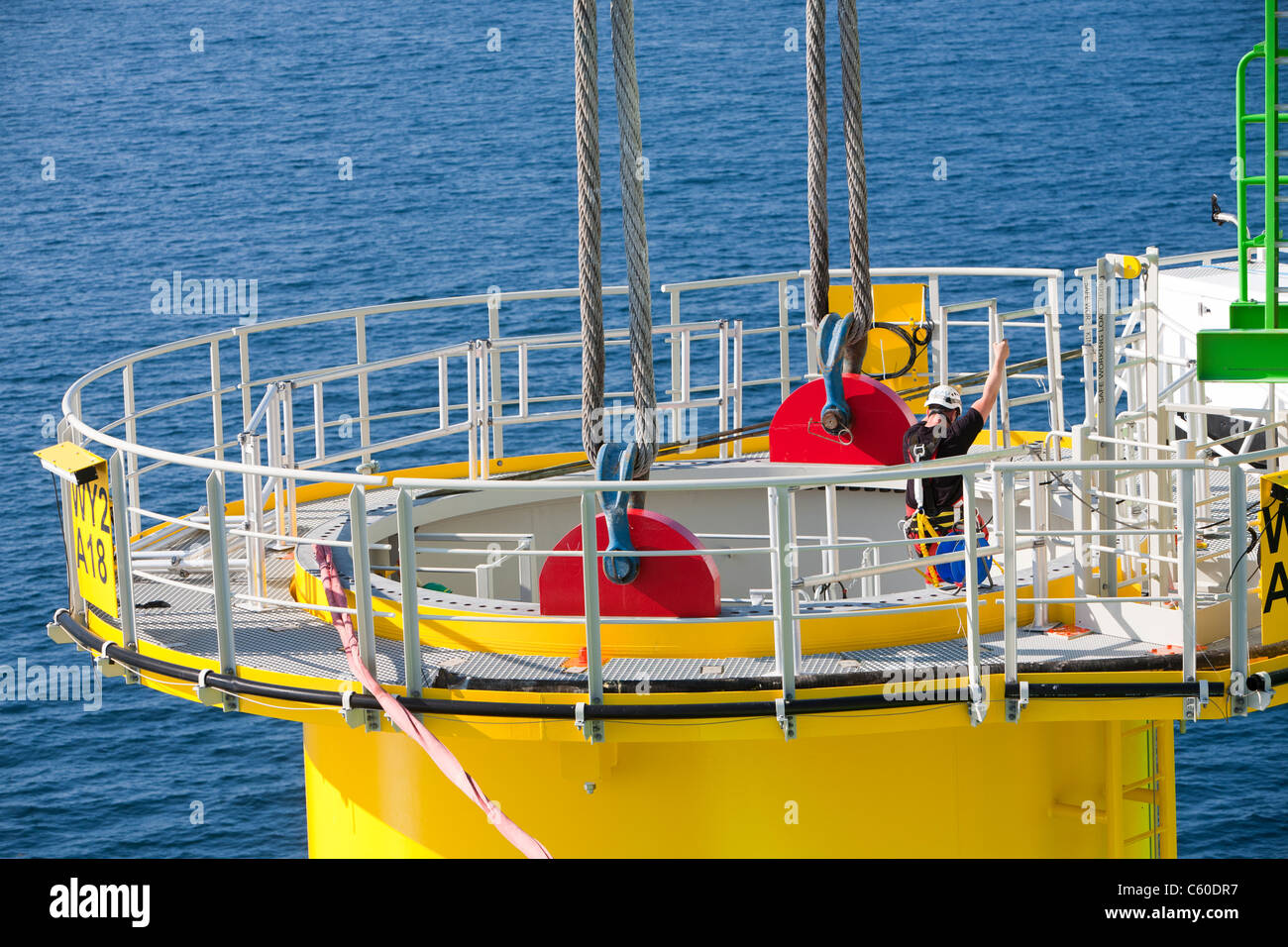 A transition piece is fitted to a monopile on the Walney offshore wind ...