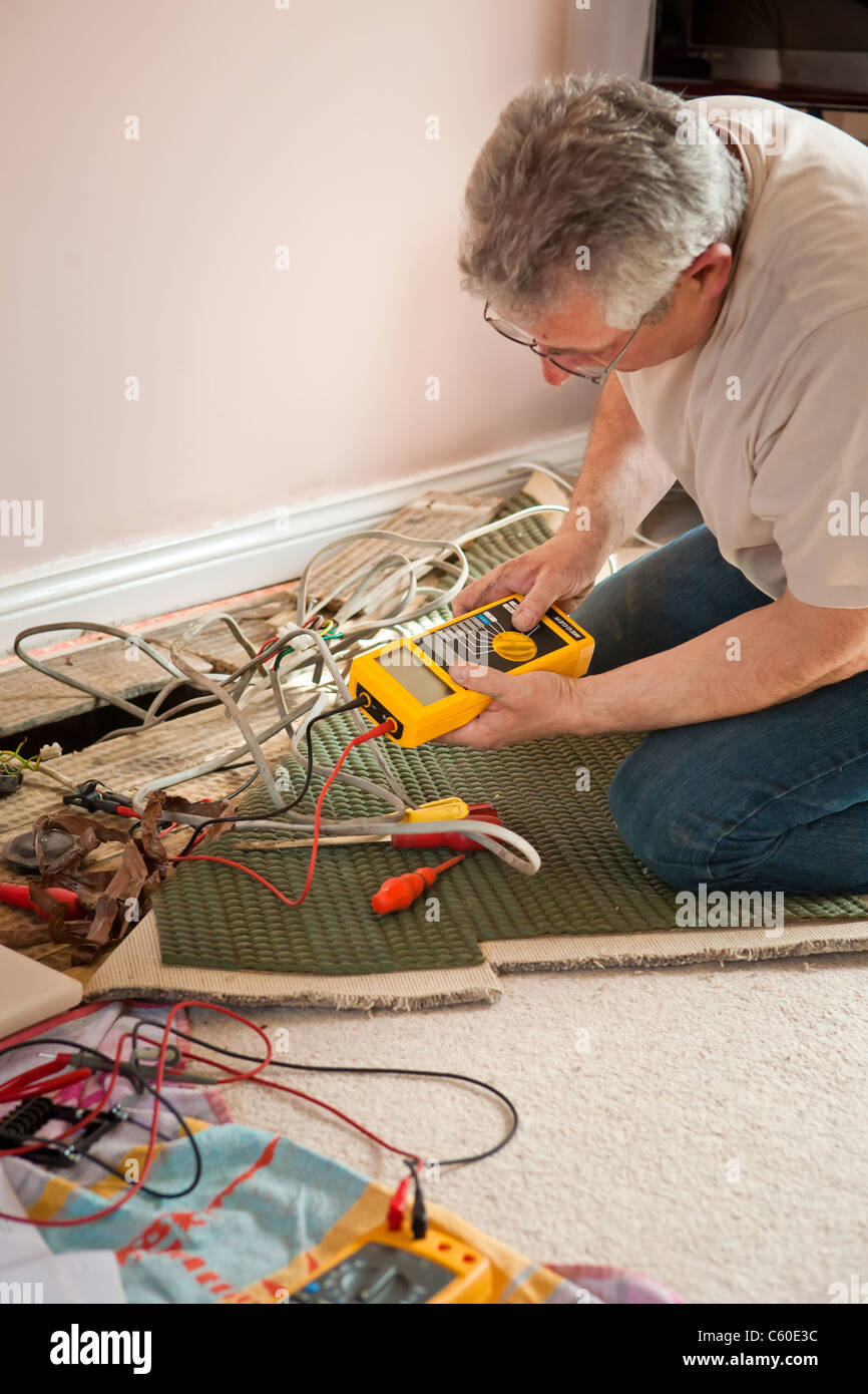 Electrician working on Cables Stock Photo - Alamy