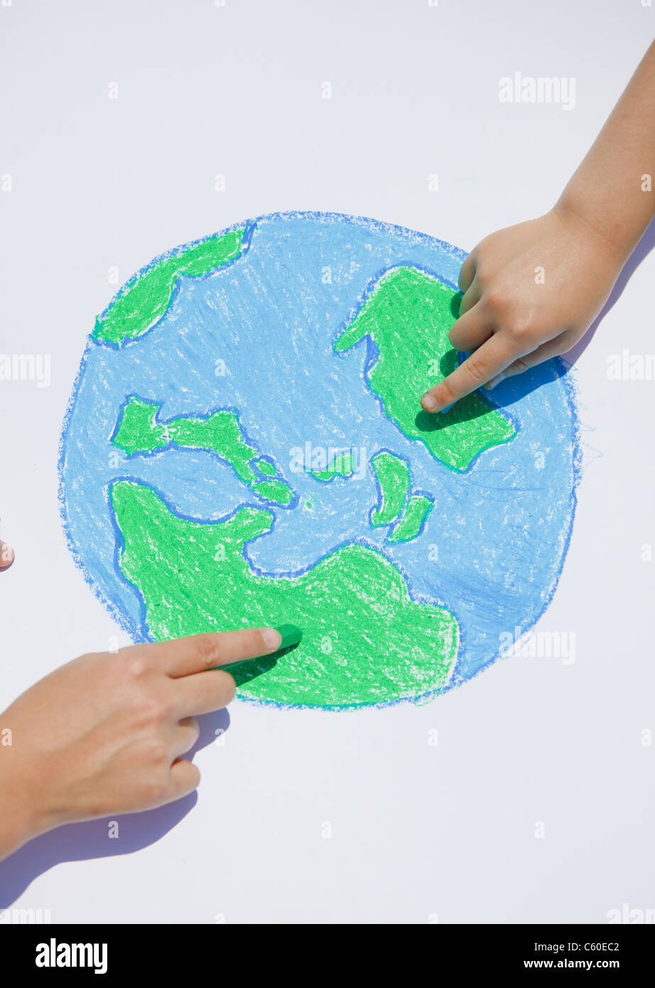 Hands drawing globe Stock Photo - Alamy