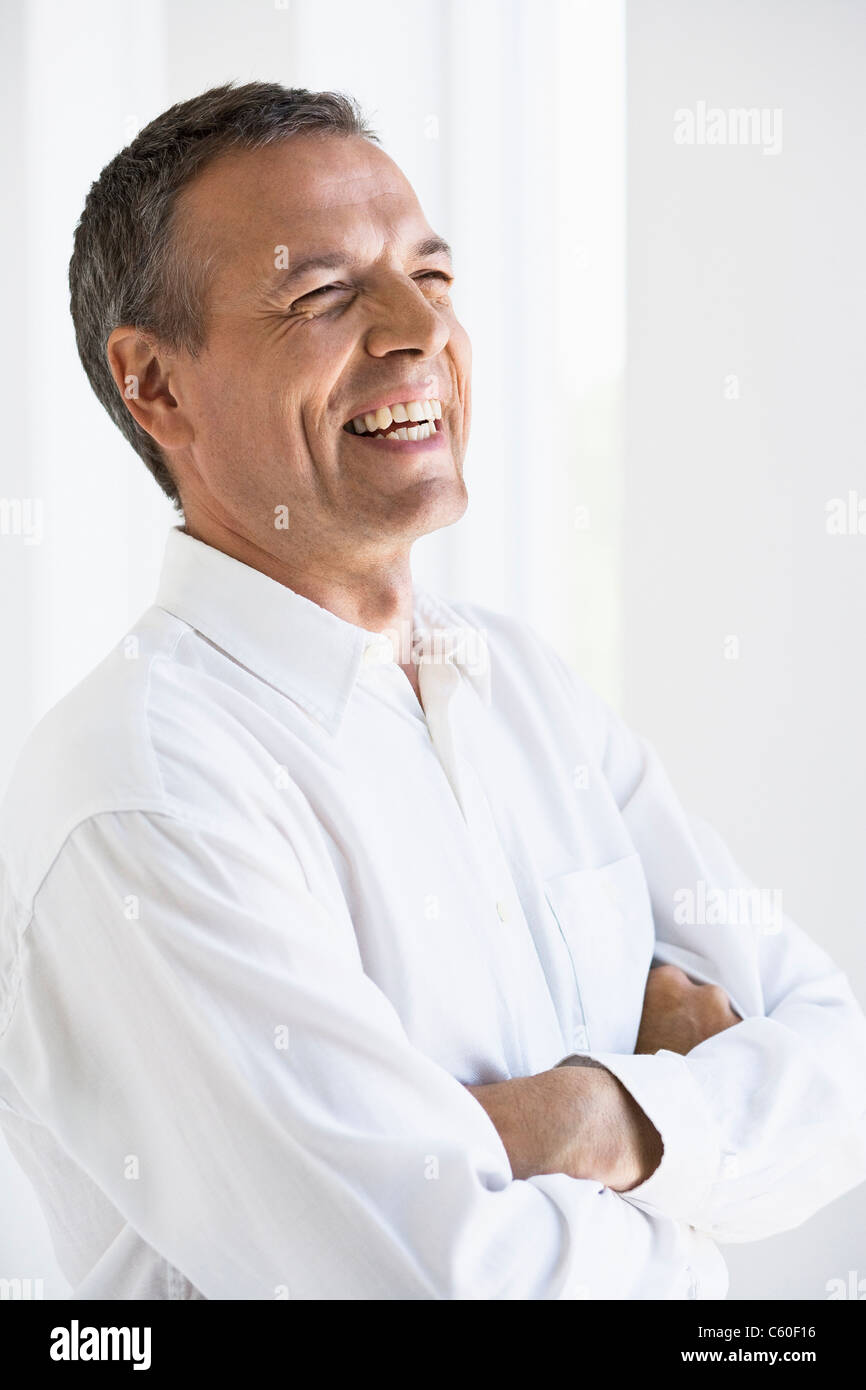 Man folding his arm hi-res stock photography and images - Alamy