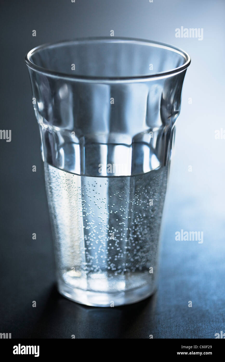 Air bubbles in glass of water Stock Photo - Alamy