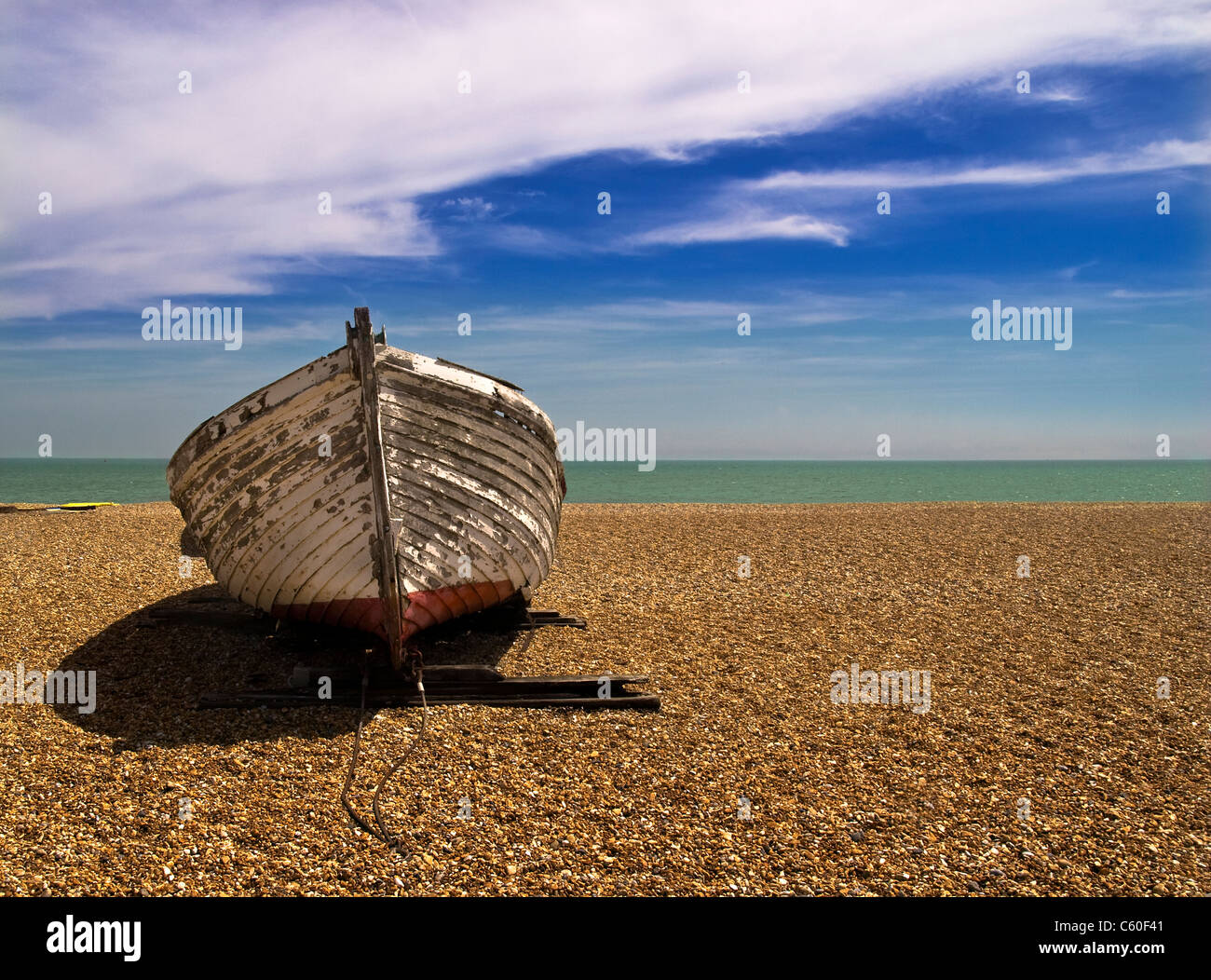 single small boat on a beach Stock Photo - Alamy
