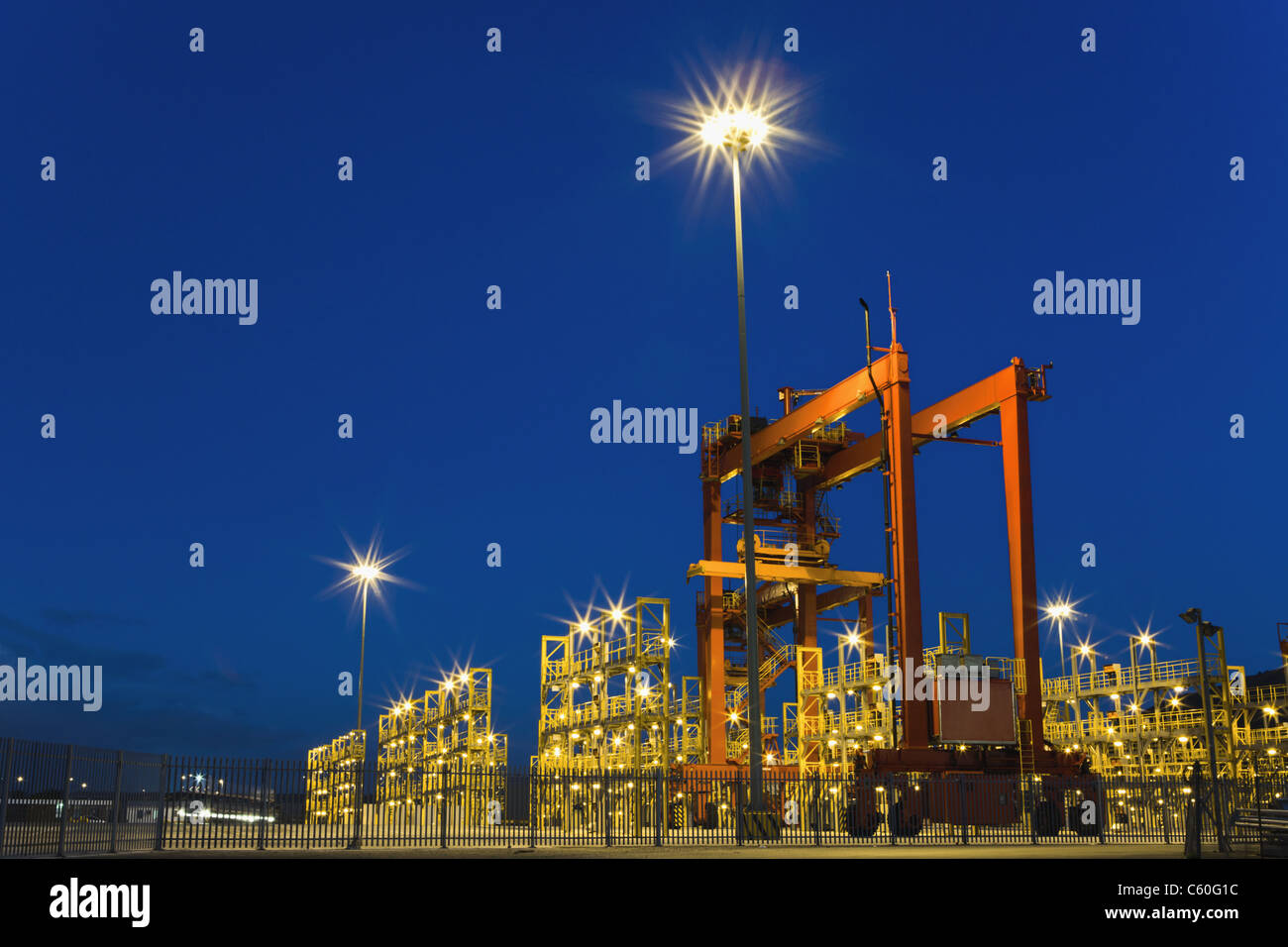 Container crane machinery in shipyard Stock Photo - Alamy