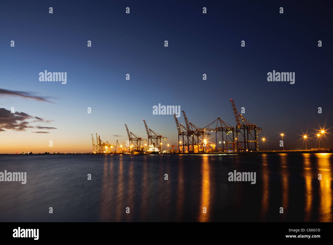 Container crane machinery in shipyard Stock Photo - Alamy