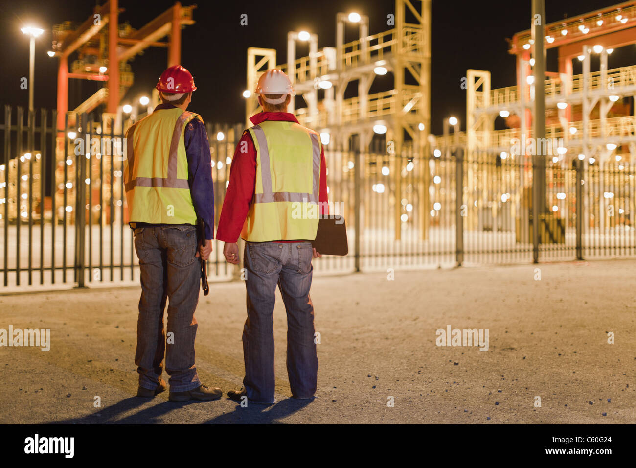 Workers standing together in shipyard Stock Photo - Alamy