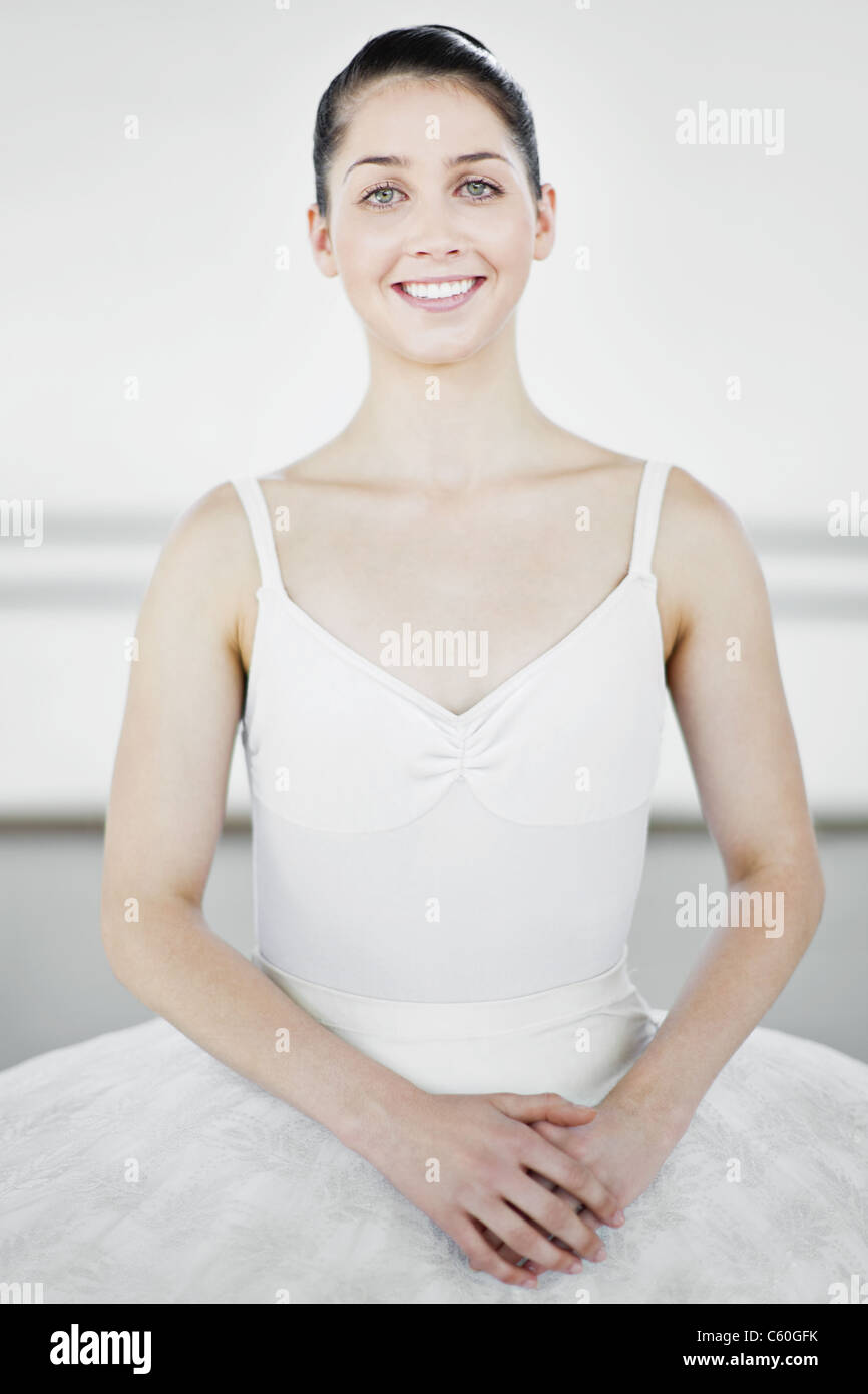 Ballet dancer smiling in studio Stock Photo - Alamy
