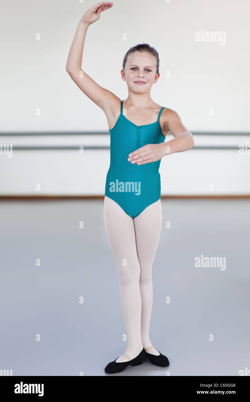 Ballet dancer standing in studio Stock Photo - Alamy
