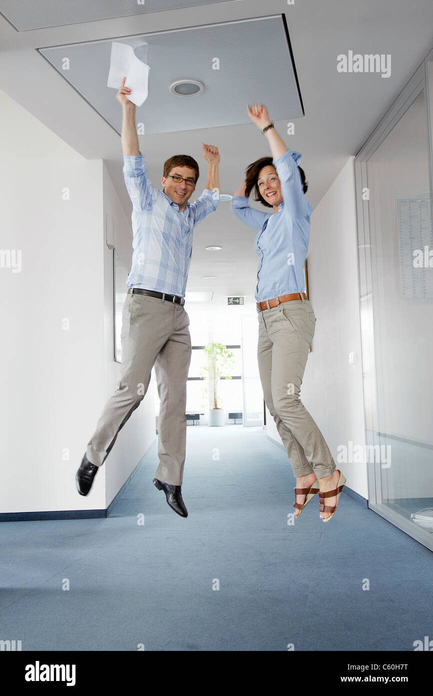 Business people jumping for joy Stock Photo - Alamy