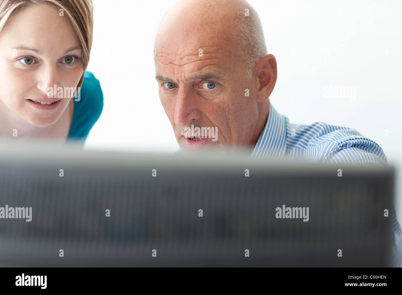 Business people using computer in office Stock Photo - Alamy