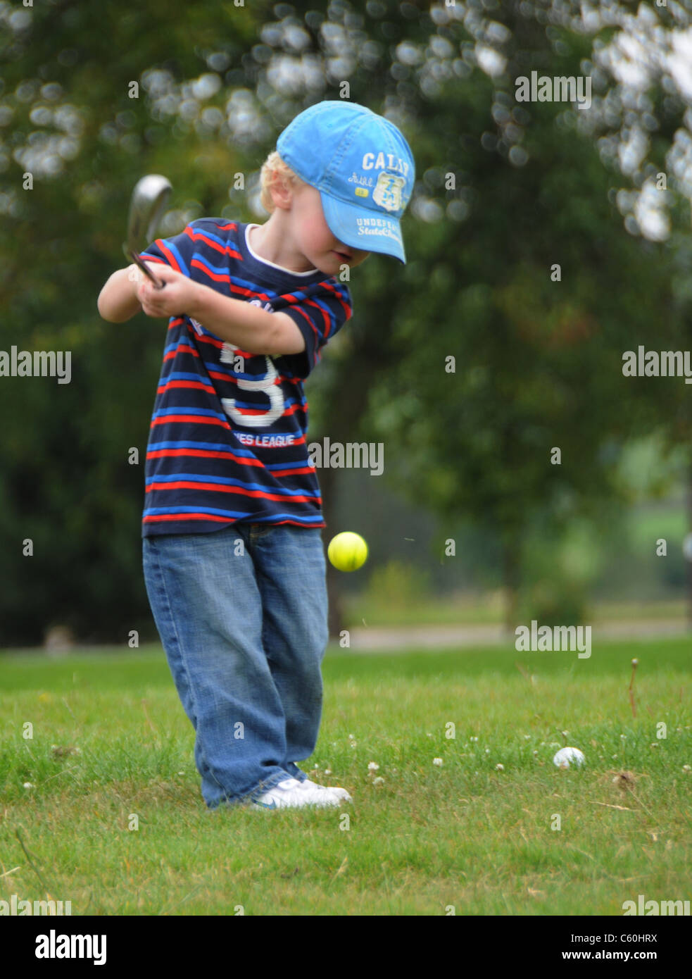 TODDLER / TWO YEAR OLD PLAYING GOLF Stock Photo - Alamy