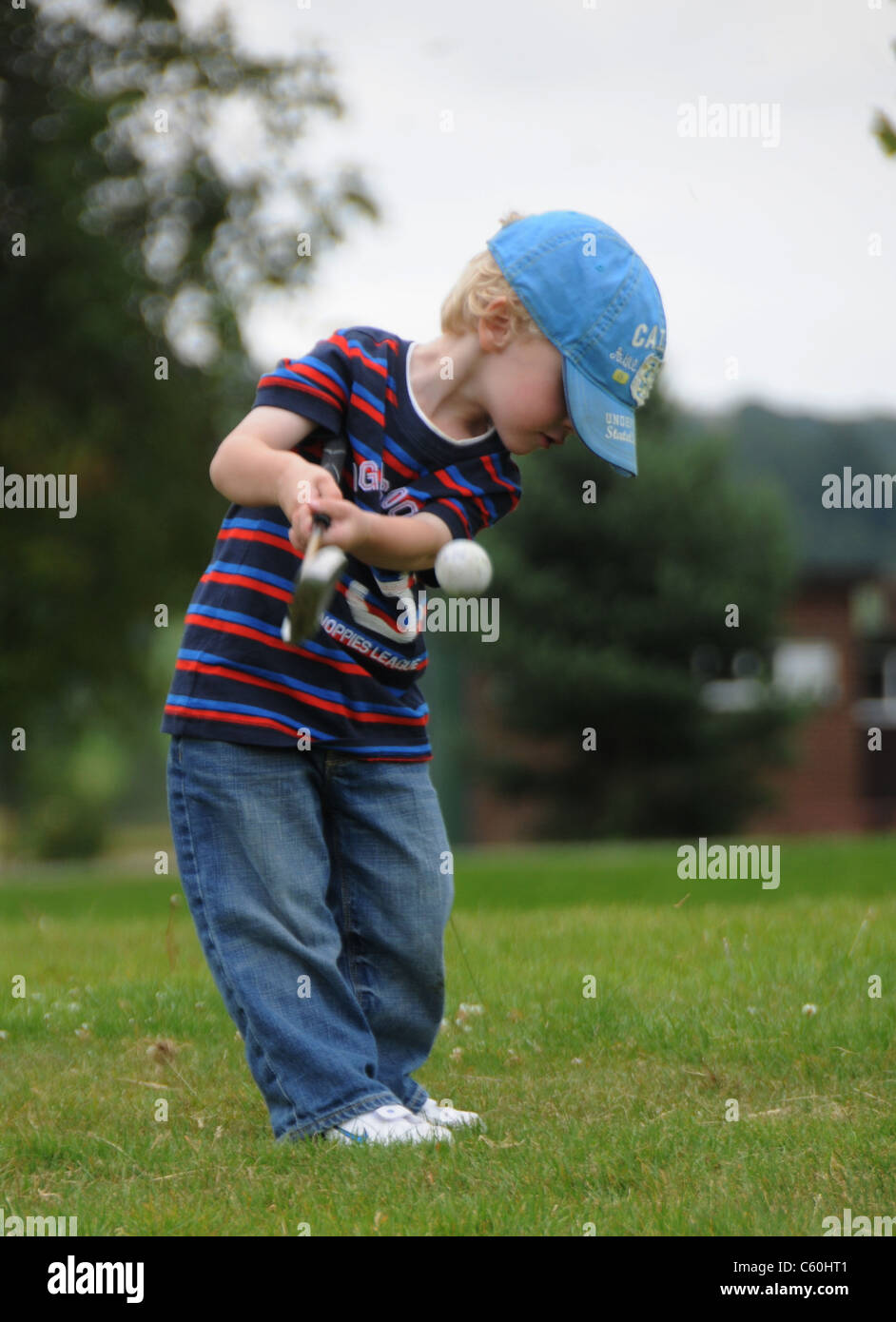 Child golf swing hi-res stock photography and images - Alamy
