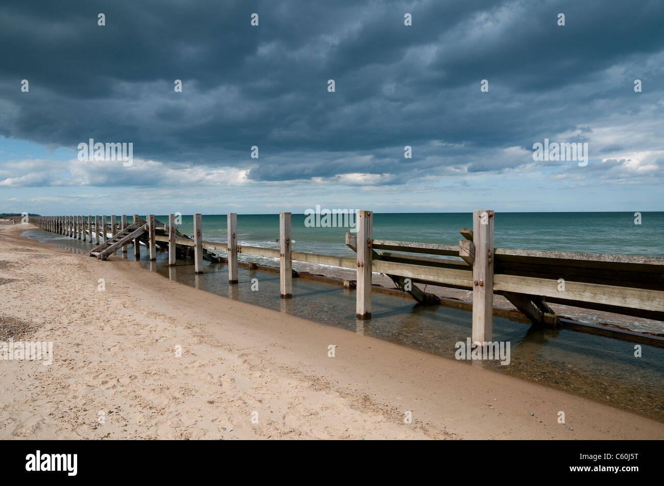 timber groynes at happisburgh, norfolk, england Stock Photo - Alamy