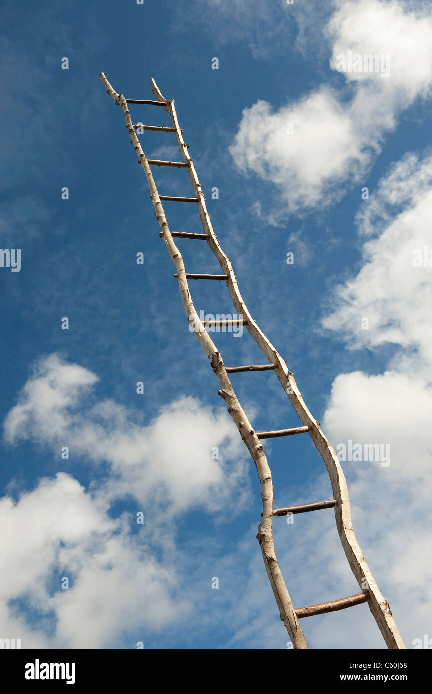 wooden crooked ladder and blue sky Stock Photo - Alamy