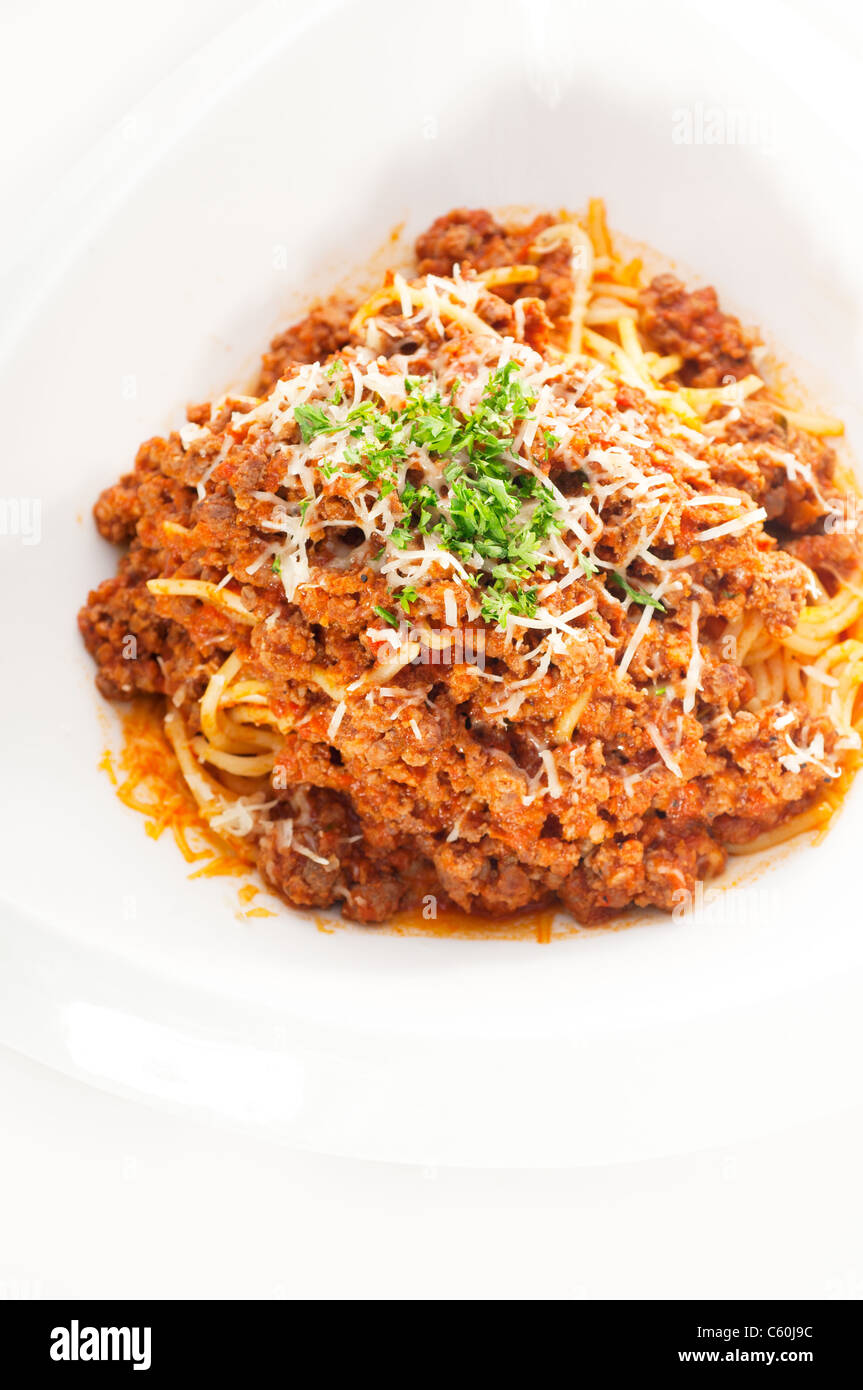 Italian classic spaghetti with bolognese sauce and fresh vegetables on ...