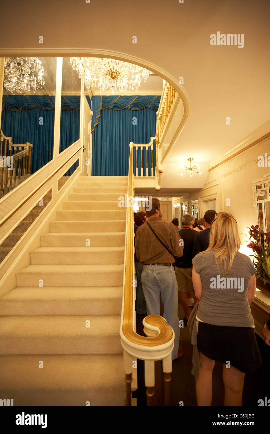 Tourists Pass Stairs To Second Floor In Graceland Mansion Memphis