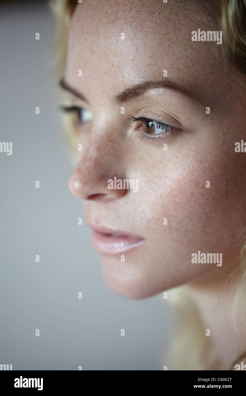 Close up of woman’s freckled face Stock Photo - Alamy