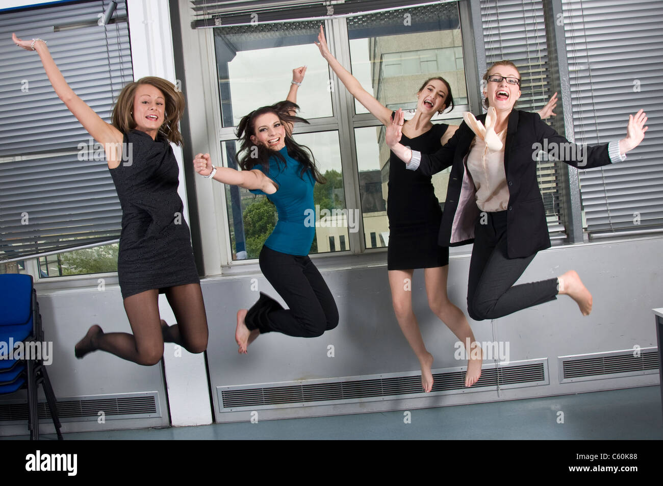 Office team jump hi-res stock photography and images - Alamy