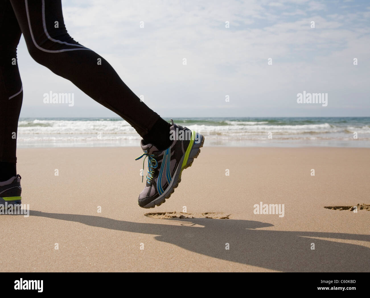 Runner footprint on beach runner hi-res stock photography and images ...