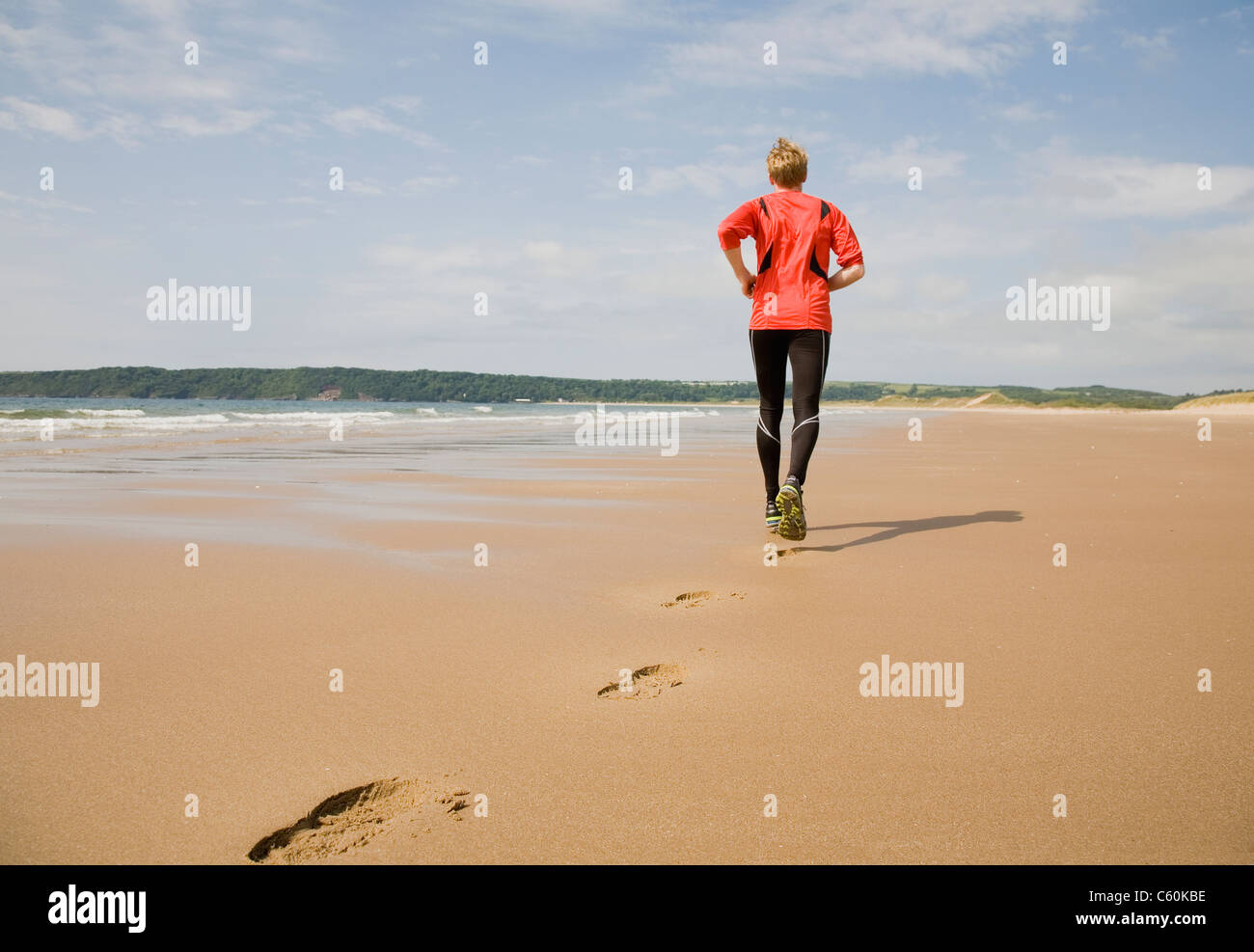 Runner footprint on beach runner hi-res stock photography and images ...