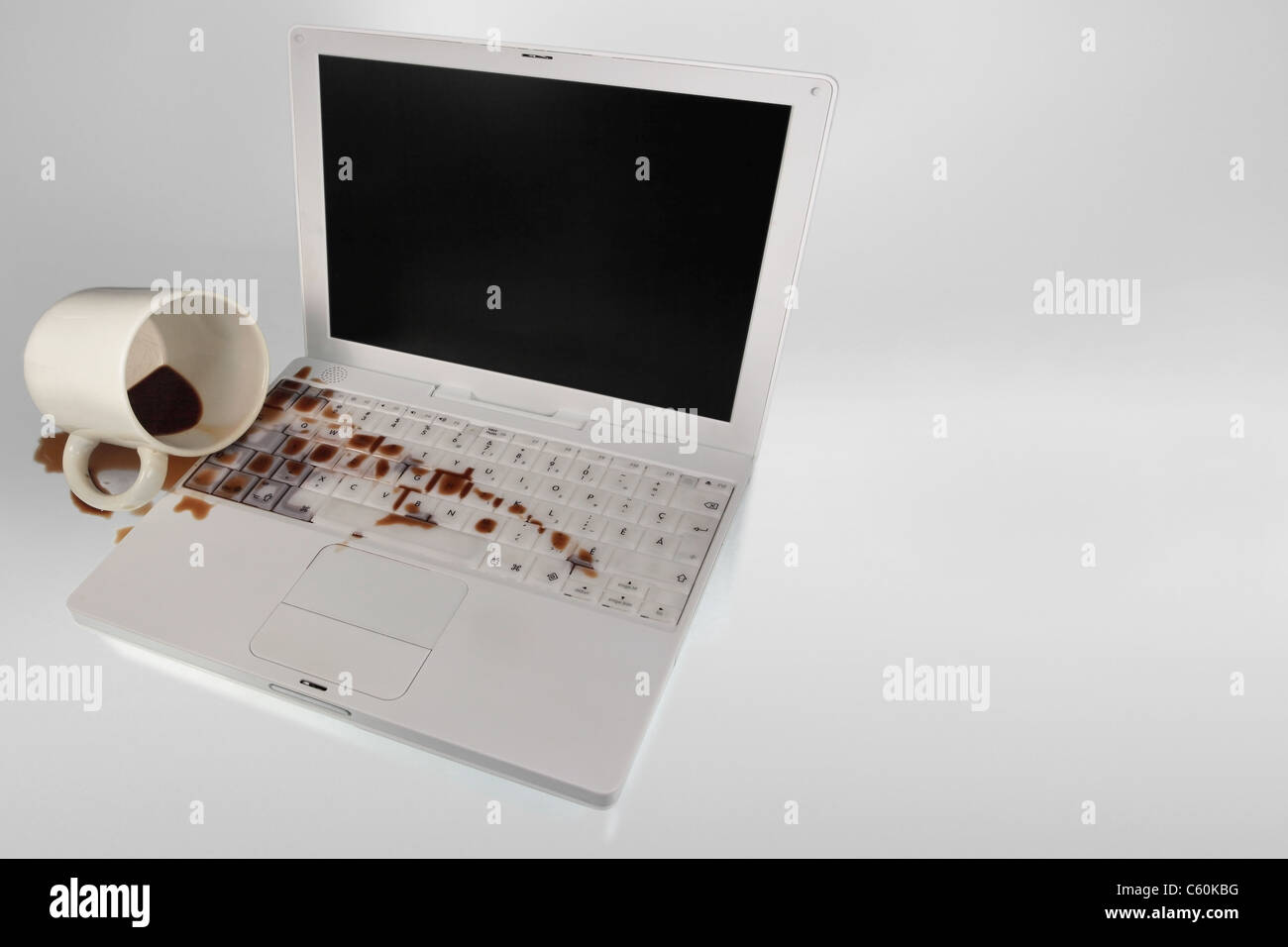 Coffee laptop spill hi-res stock photography and images - Alamy