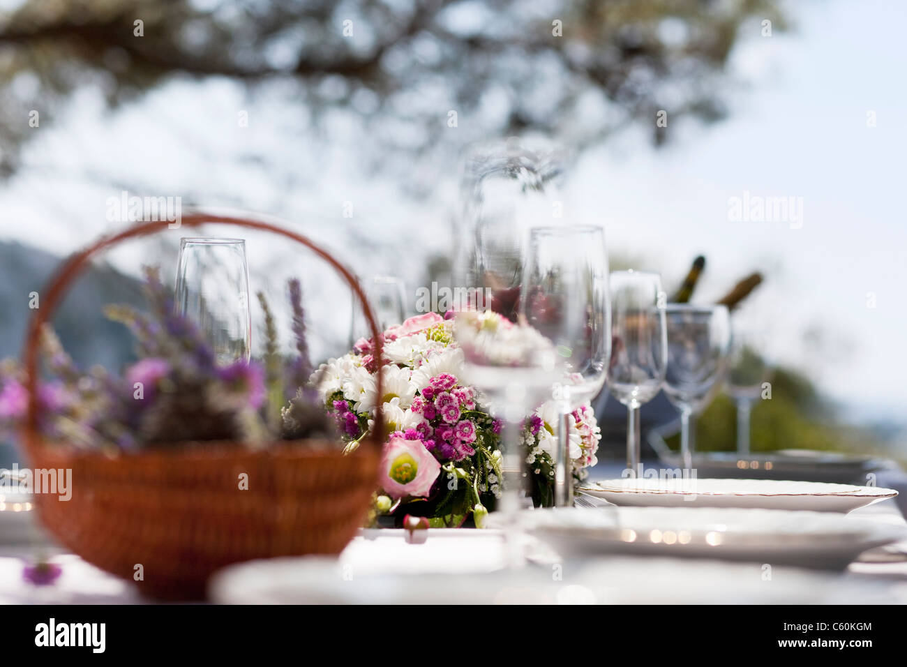 Table set with flowers and flatware Stock Photo - Alamy