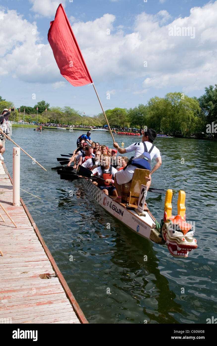 Hanalai DBC Dragon Boat collecting their flag for finishing in fifth ...