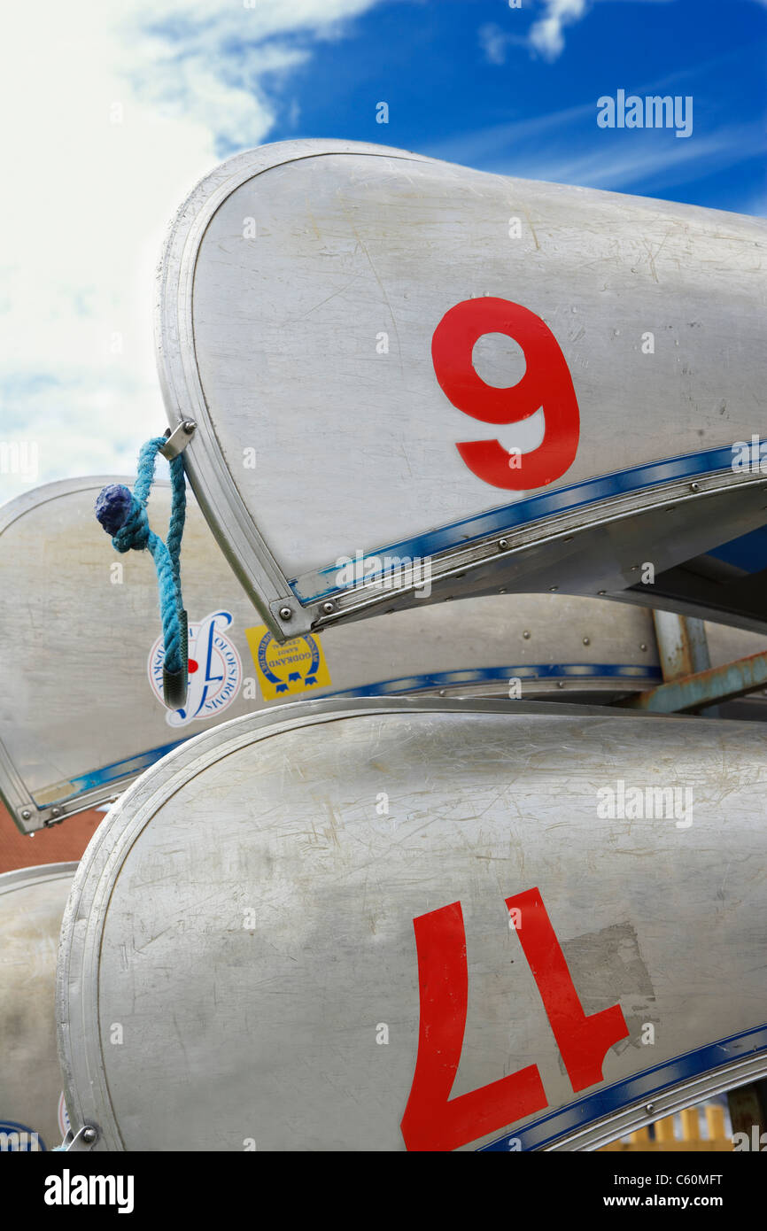 Close up of numbered canoes Stock Photo - Alamy