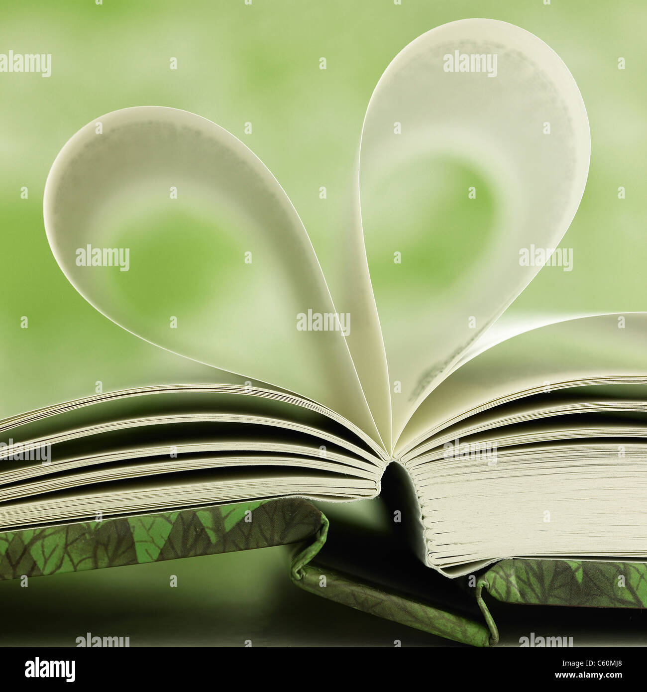 Pages of a book forming the shape of the heart Stock Photo - Alamy