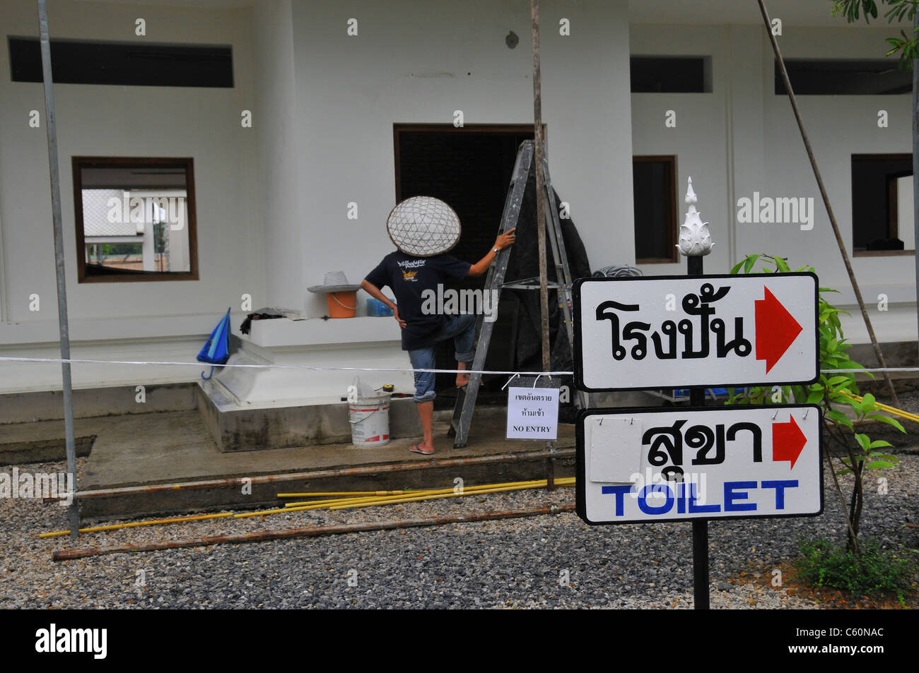 Man with hat in a temple hi-res stock photography and images - Alamy