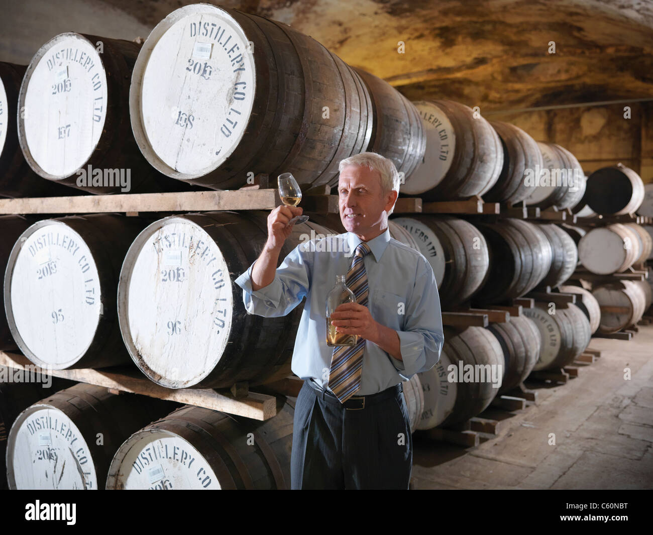 Man with arms raised in warehouse hi-res stock photography and images ...
