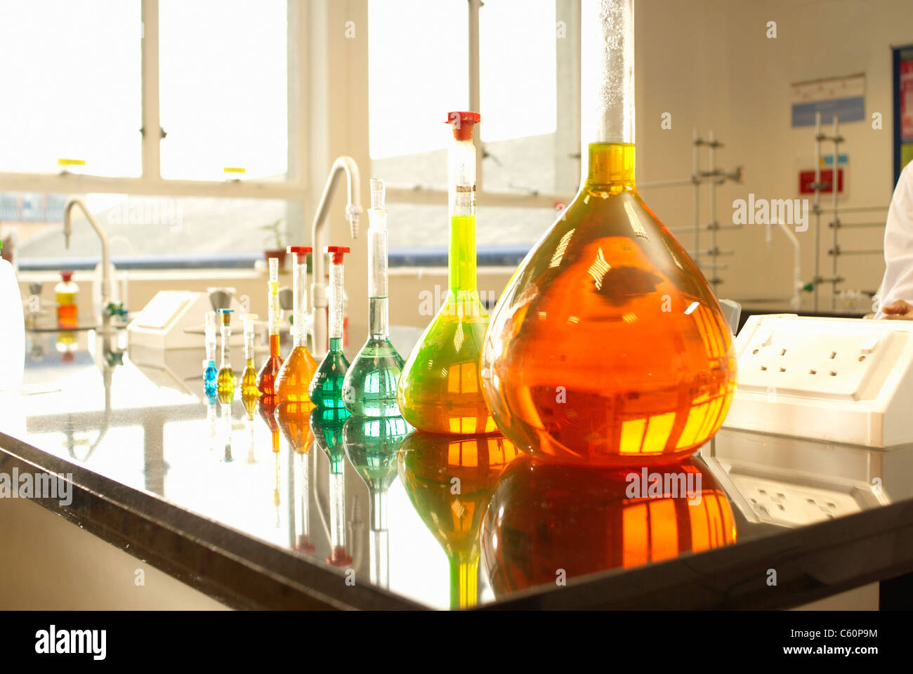 Beakers of liquid in factory Stock Photo - Alamy