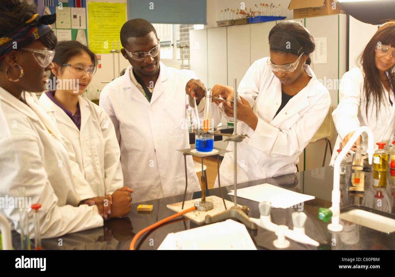 Scientists at work in lab Stock Photo - Alamy