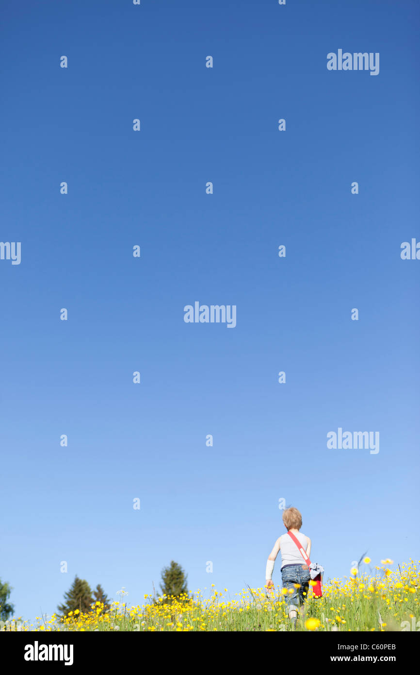 Boy walking hill hi-res stock photography and images - Alamy