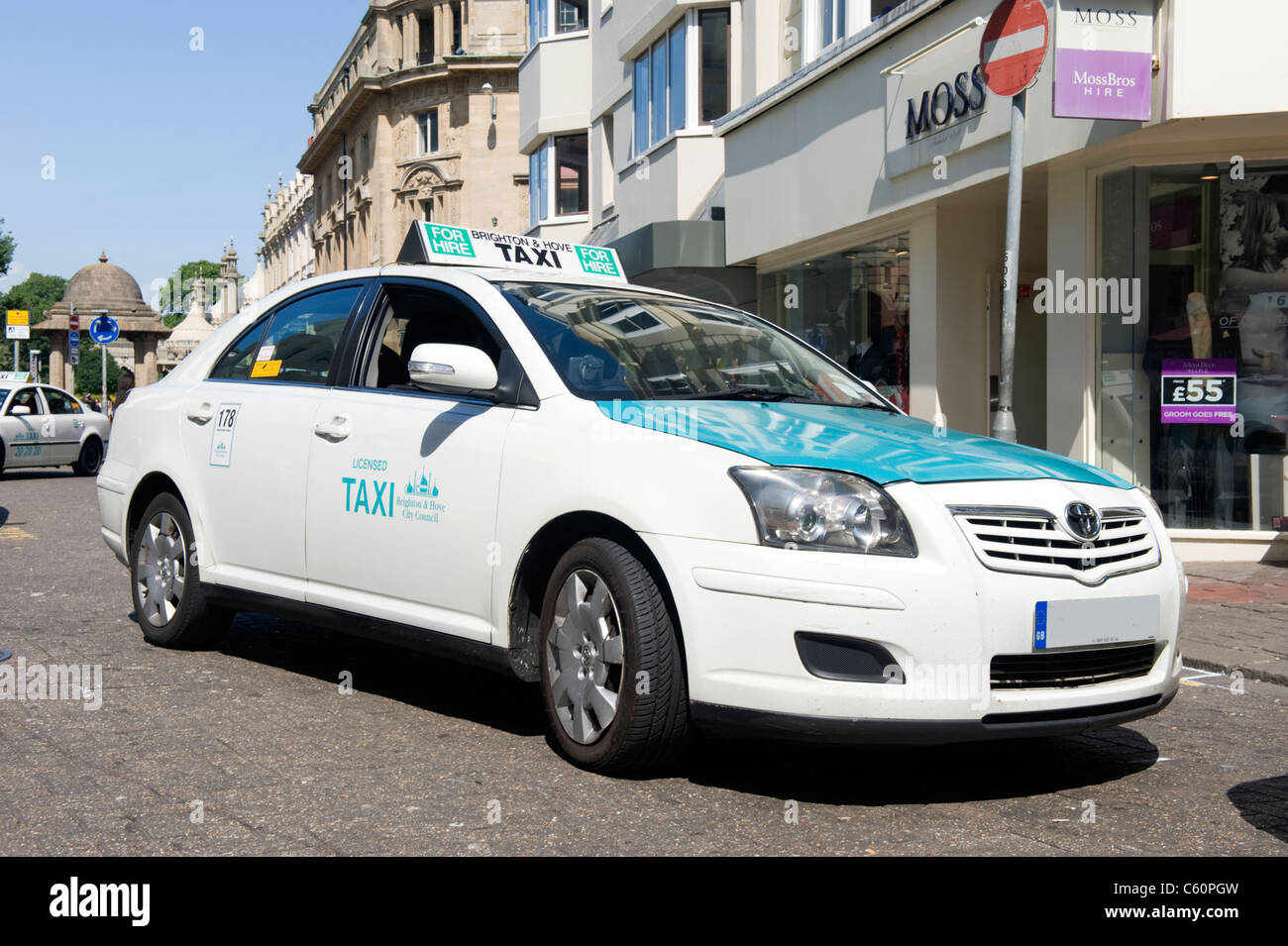 Brighton East Sussex typical licensed Toyota taxi cab in turquoise ...
