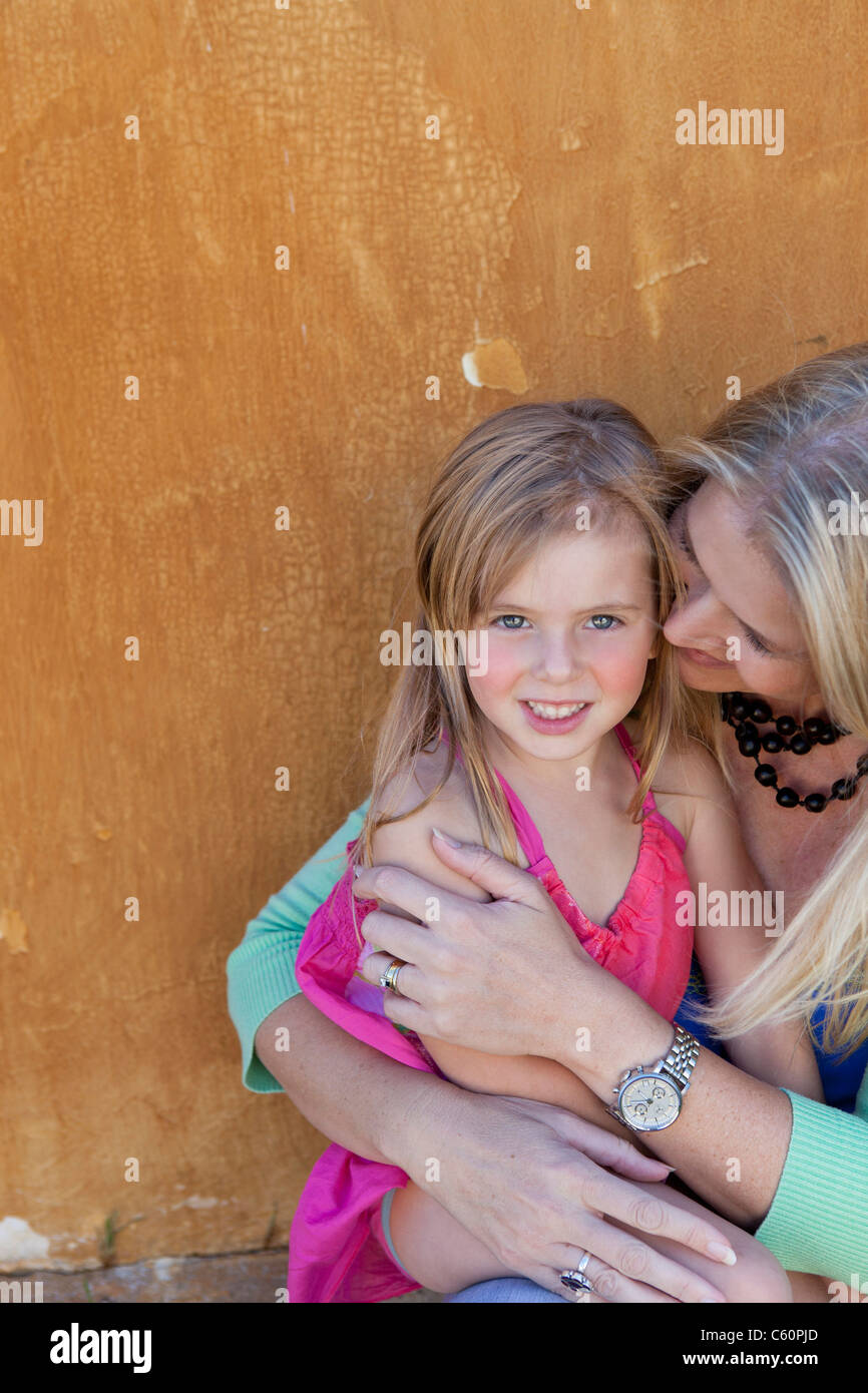 Mother embracing daughter outdoors Stock Photo - Alamy Mother embracing daughter outdoors Stock Photo - Alamy