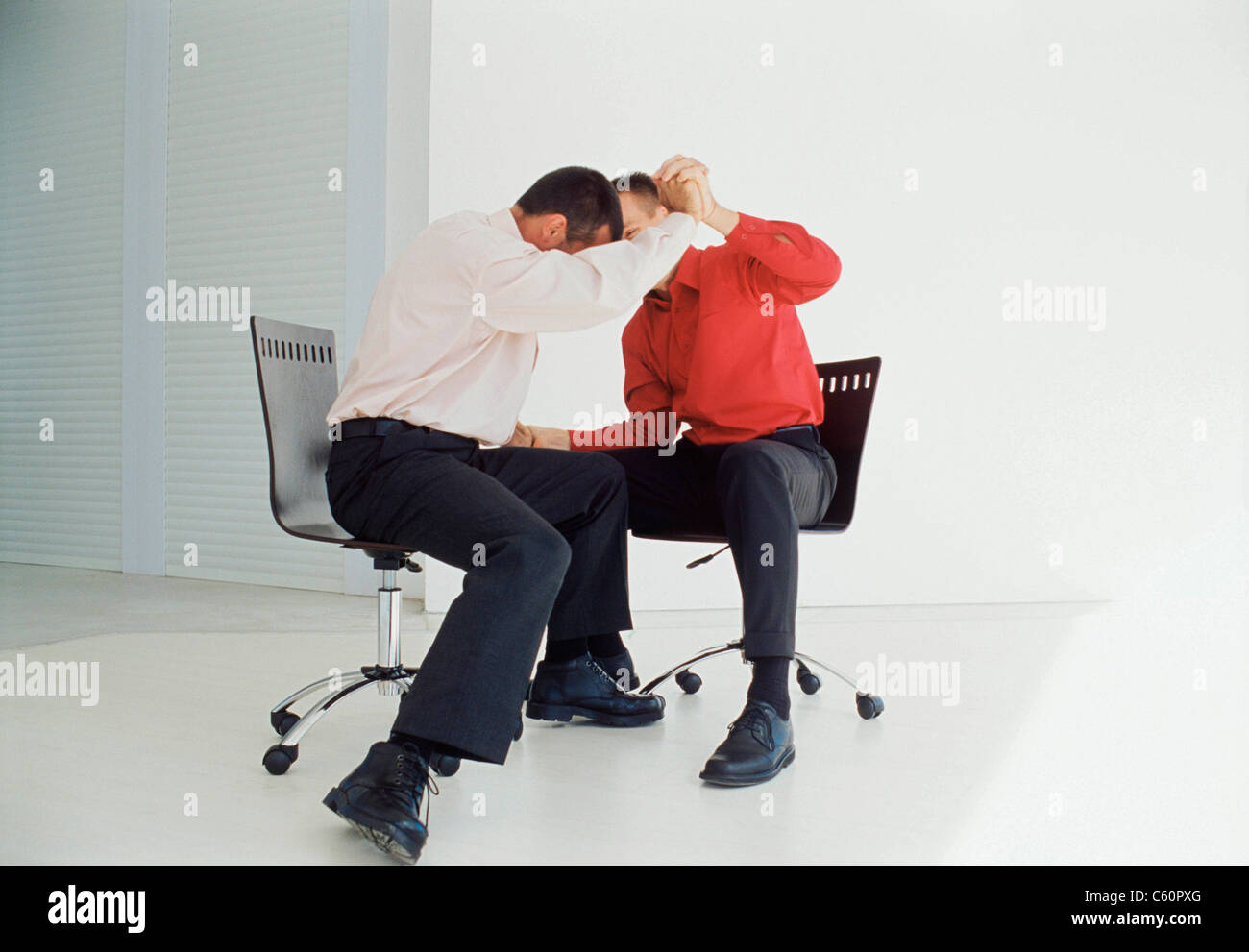 Fighting chairs hi-res stock photography and images - Alamy