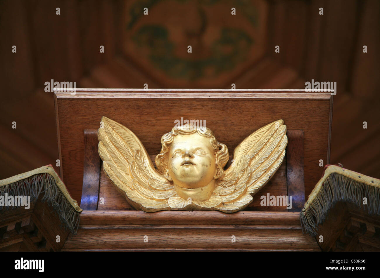 Golden angel in church Stock Photo - Alamy