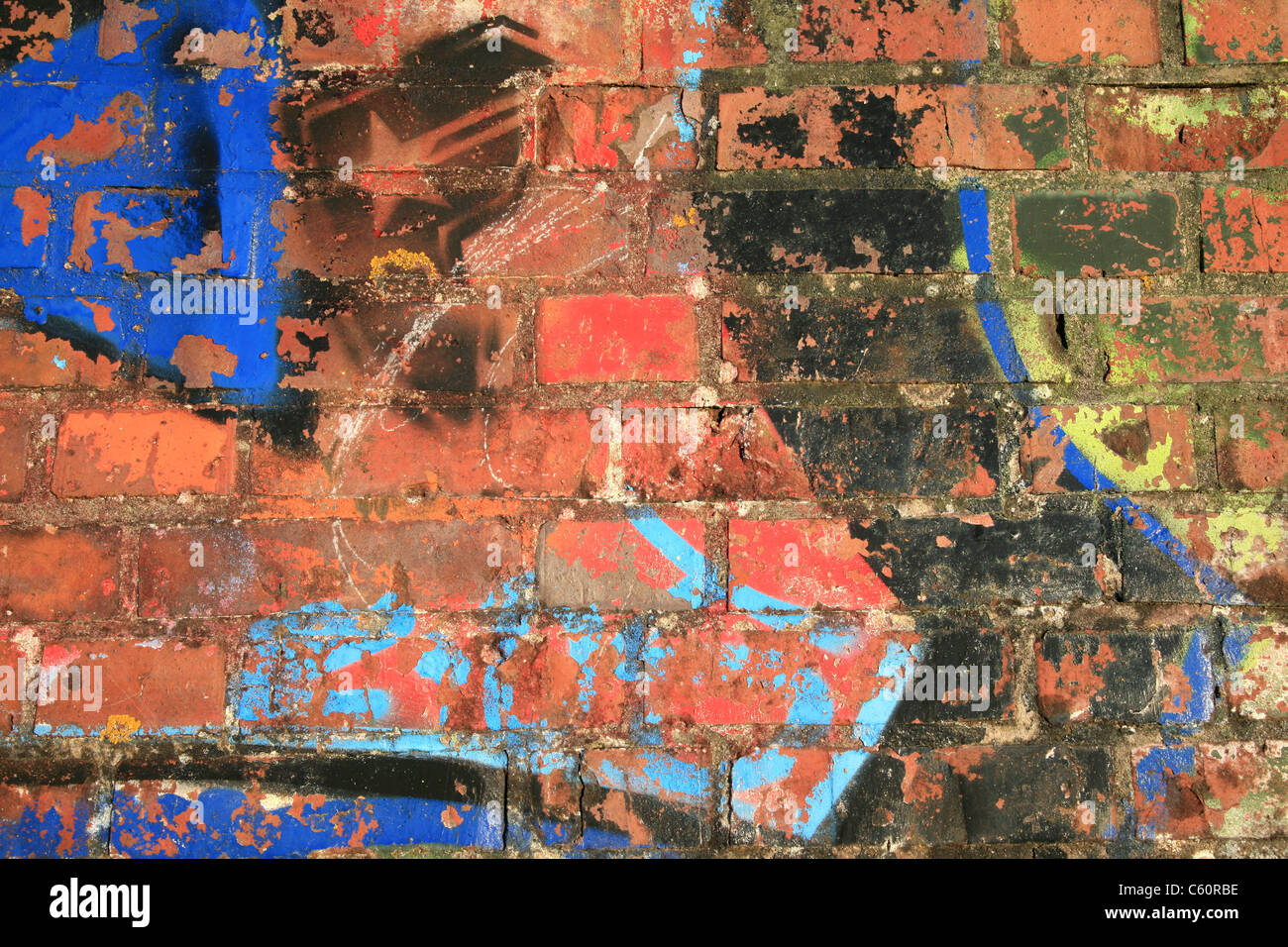 Brick wall with graffiti Stock Photo - Alamy
