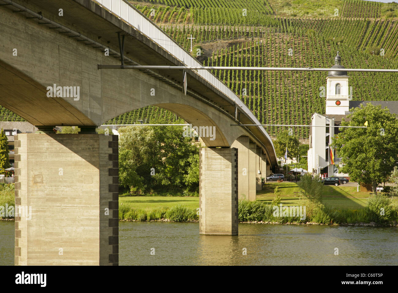 Modern road bridge across the river Mosel looking towards the village ...