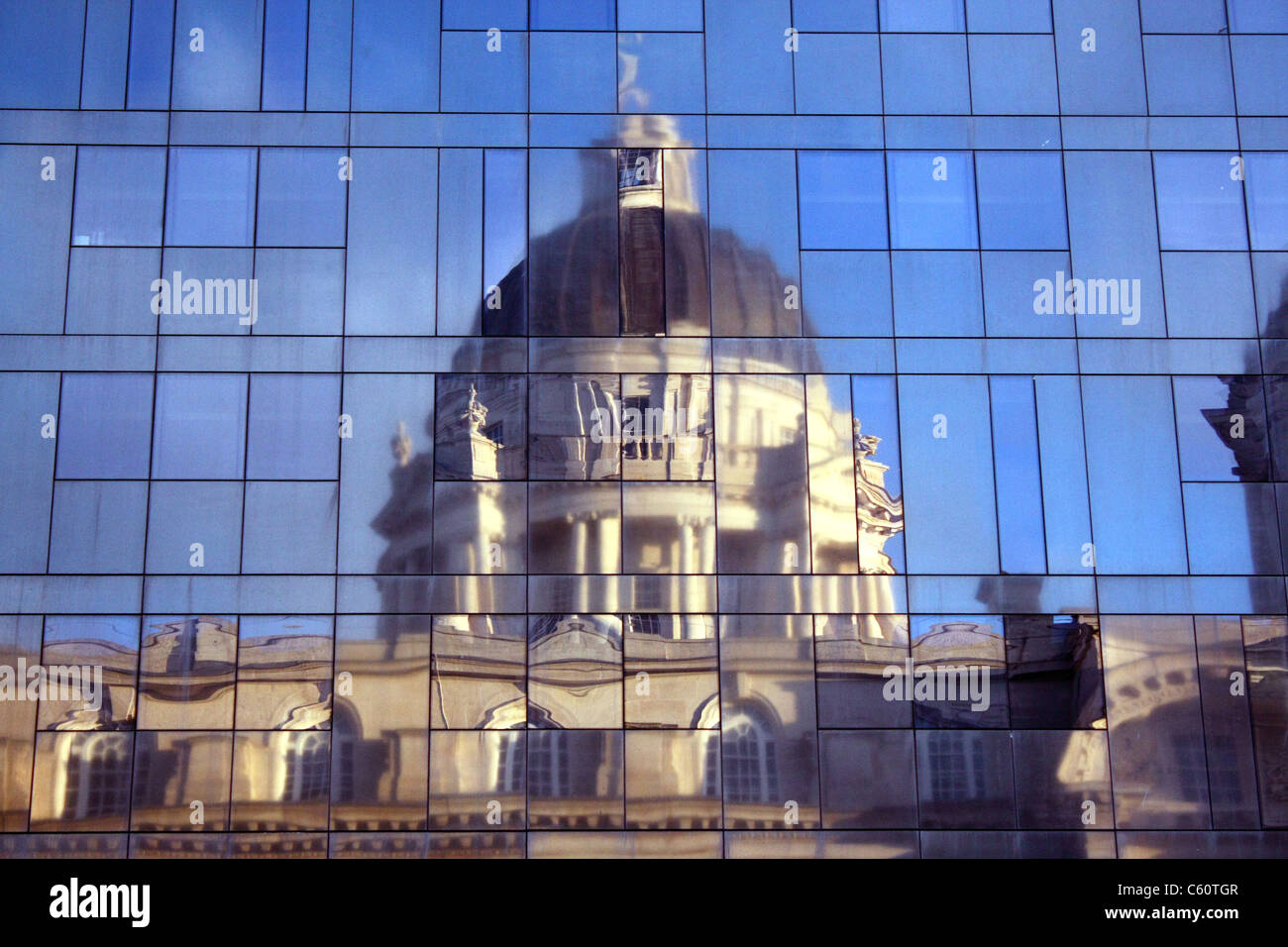 Reflection of the Port of Liverpool Building in a new building opposite ...