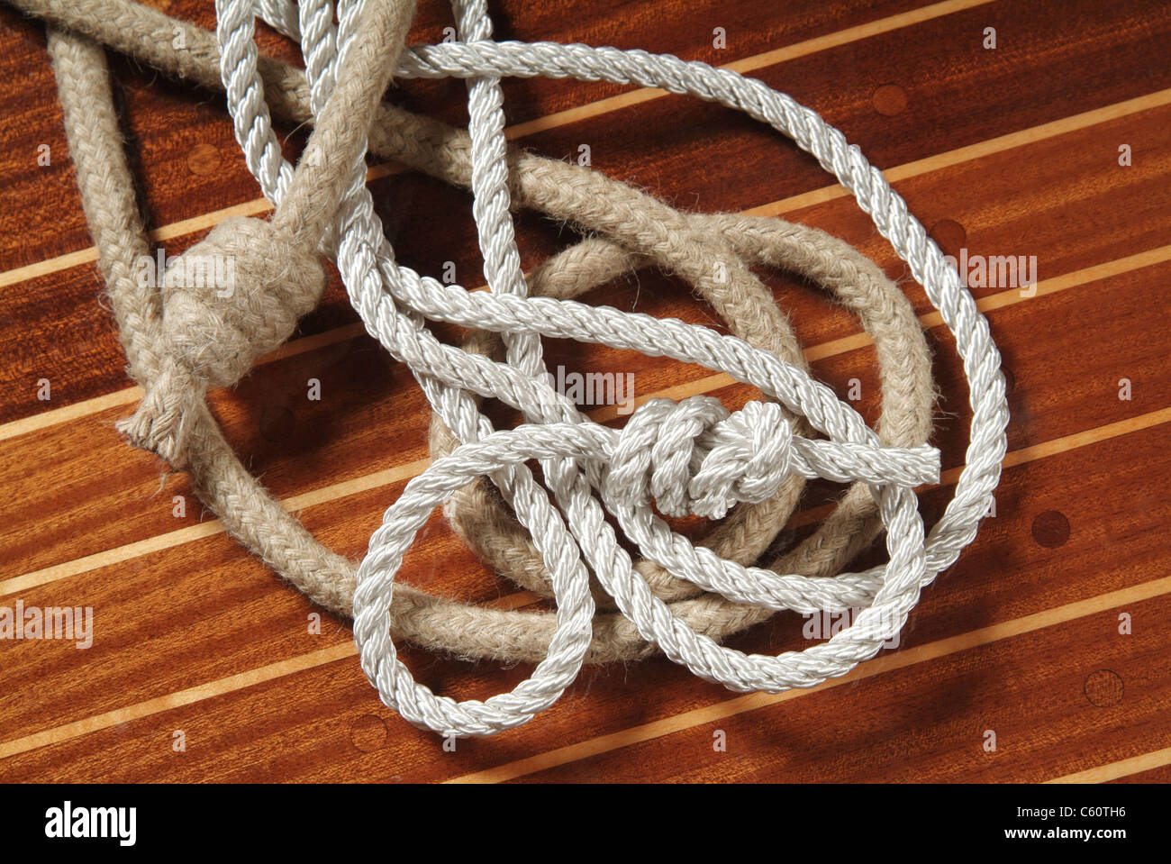 Ropes with knots on their ends Stock Photo - Alamy